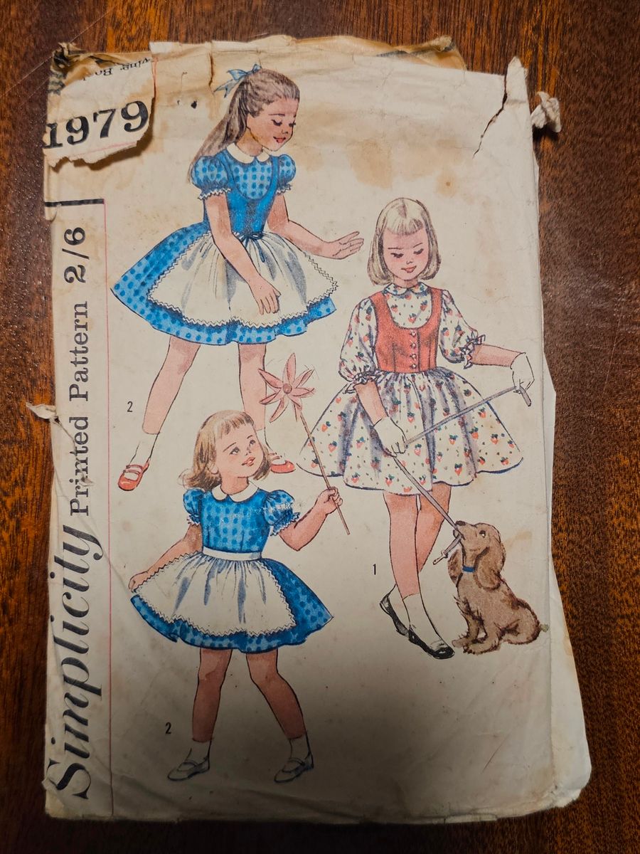 1979 | Child's one-piece dress, weskit and apron by | Threadloop